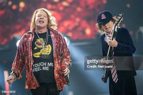 Neil Lupin And Angus Young Photos And Premium High Res Pictures Getty