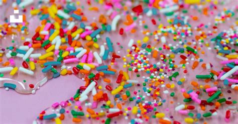 A Bunch Of Sprinkles That Are On A Table Photo Free Sprinkles Image