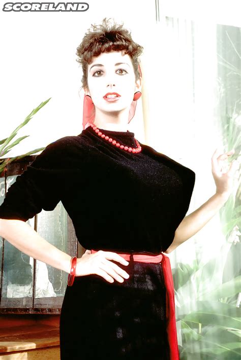 Older Big Tit Model Devon Daniels Struts In Stockings While Baring