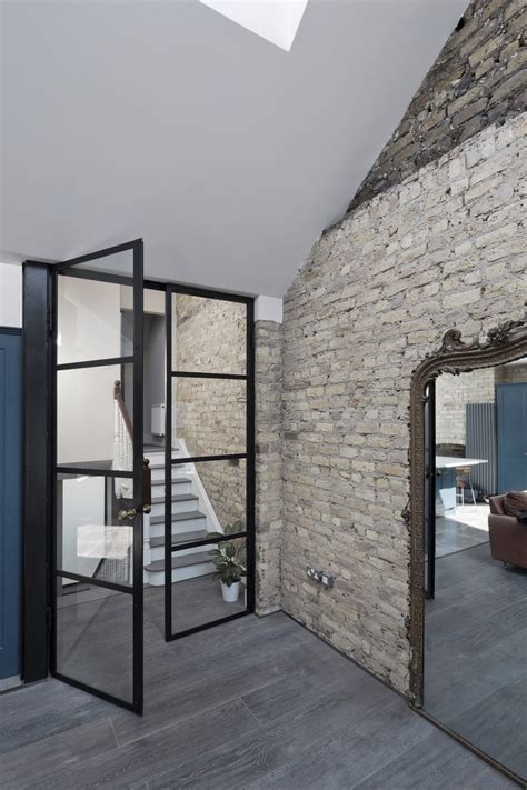 Scullion Architects Adds Charred Larch Tower To Terraced Home In Dublin