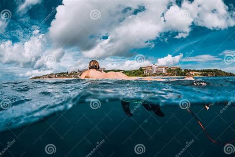 Surf Girl Floats On Surfboard Naked Woman In Ocean During Surfing