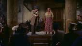 Ms Auctioneer Selling Woman Slave Few Bidders In Foreground Hd Stock