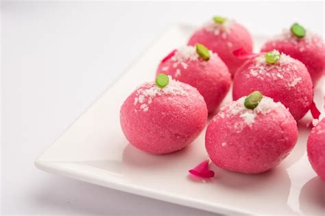 Premium Photo Delicious Pink Chumchum Or Rose Flavour Cham Cham Or Rasgulla Or Rasagola