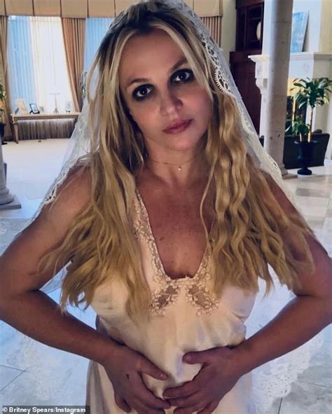 Britney Spears Smolders For The Camera In A Sheer Nightgown And Lace