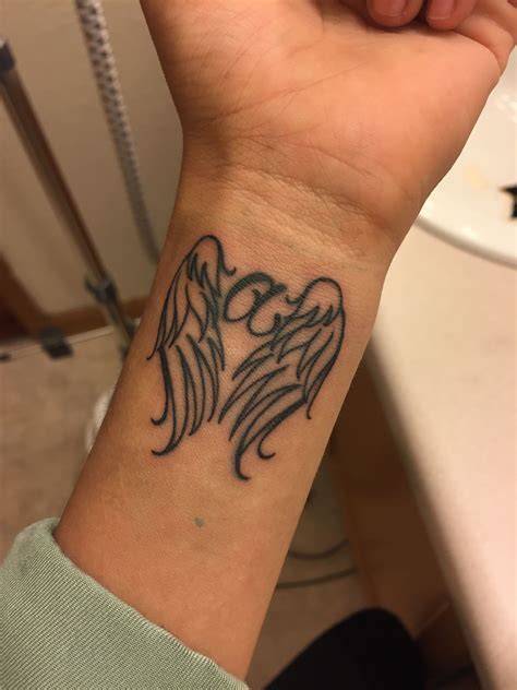 Angel Wings Wrist Tattoo Printable Calendars At A Glance