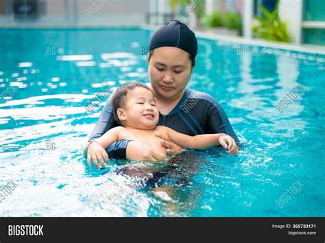 Young Asian Mother Image And Photo Free Trial Bigstock