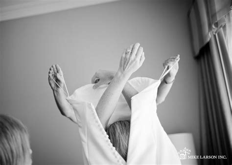 Getting In The Dress Bride Getting Ready Wedding Shots Bride