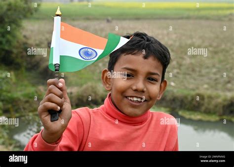 Happy Moments Of The Rural Village Little Boy With National Flag At