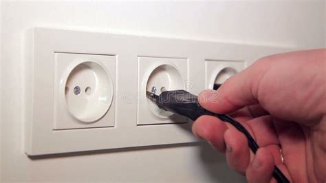 Inserting The Electrical Plug Into The Socket Stock Footage Video Of