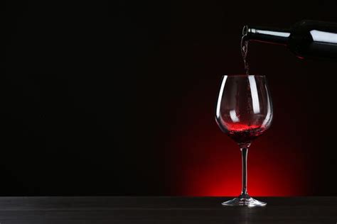Wine Pouring Black Background