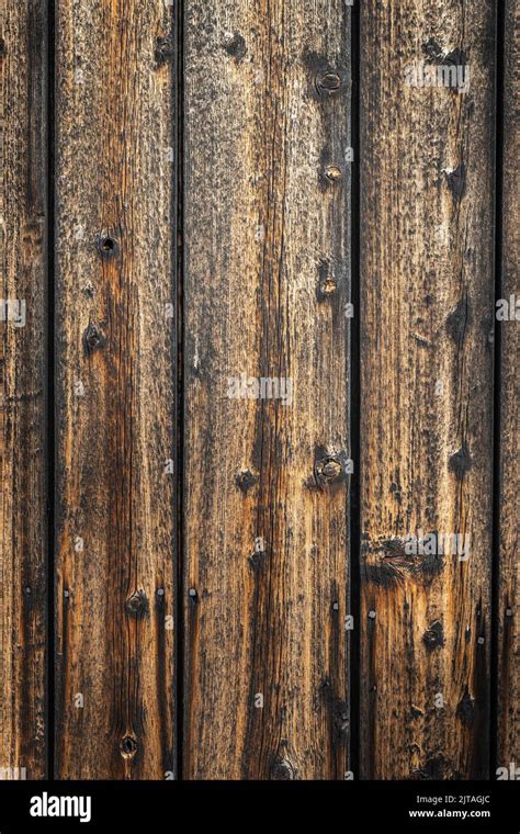 A Vertical Shot Of Aged Weathered Wood Texture Perfect For Background