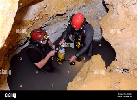 Cave Research Romania Researchers Preparing To Dive In A Flooded