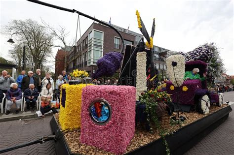 Festive Float Decorated With A Vibrant Floral Arrangement At The Flower Parade Bollenstreek