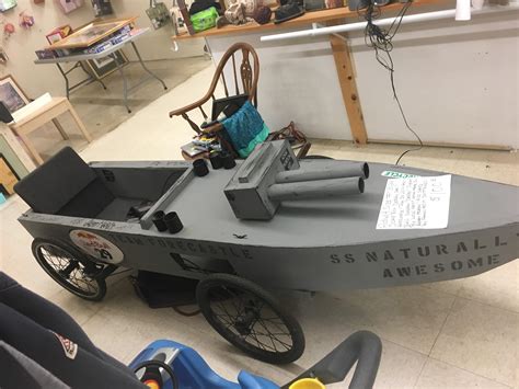 The Ss Naturally Awesome The Sign Reads “adult Size Soap Box Derby