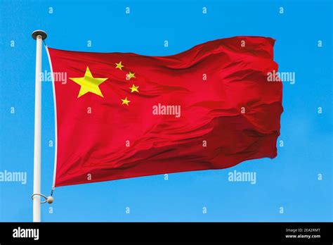 The Flag Of China Close Up Five Starred Red Chinese Flag Is Against