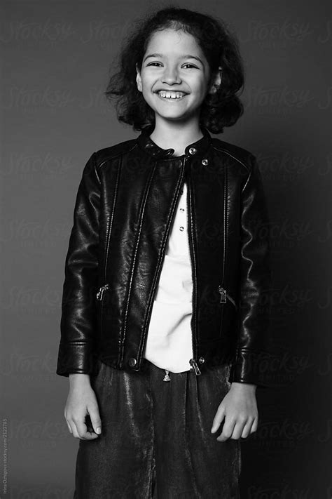 Monochrome Portrait Of A Smiling Girl By Stocksy Contributor Irina