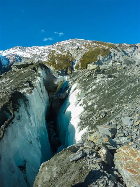 Franz Josef Deep Crevasse Cuts Through Ice Of Franz Josef Glacier