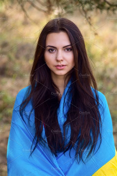 Beautiful Brunette Model Posing In A Park With Flag Of Ukraine Containing People Images