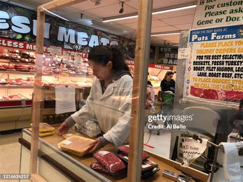 Cashier Plexiglass Photos And Premium High Res Pictures Getty Images