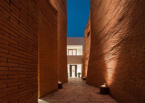 Fluted Brick Walls Frame Views Above Boutique Thailand Hotel
