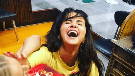 Selena Gomez Wore The Same Yellow Shirt Two Days In A Row Teen Vogue