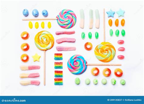 Mixed Collection Of Colorful Candy On White Background Flat Lay Top