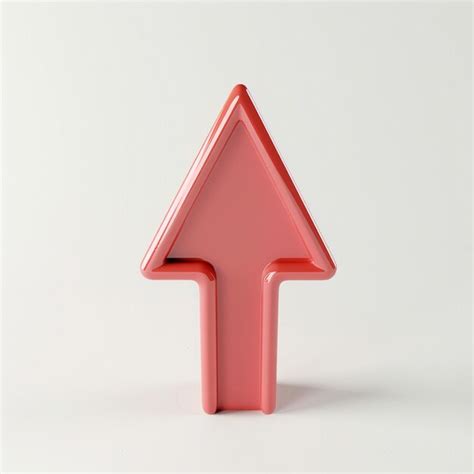There Is A Red Arrow Shaped Object On A White Surface Generative Ai Premium Ai Generated Image