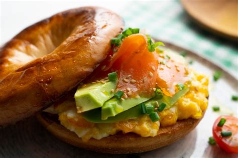Premium Photo Toasted Bagel With Avocado Egg And Salmon Very