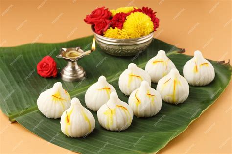 Premium Photo Indian Sweets Modak Which Is Offered As Prasad To Elephant Headed God Lord