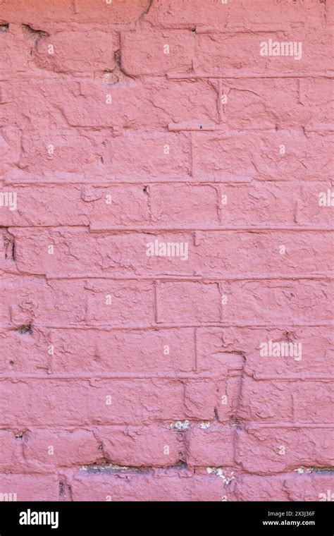 A Detailed Closeup Of A Symmetrical Pattern Of Brown Brickwork