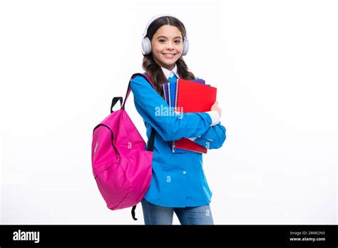 School Girl Teenage 12 13 14 Years Old In Headphones And Books On