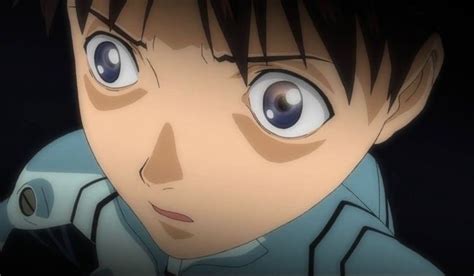 An Anime Character With Big Blue Eyes Staring At The Camera