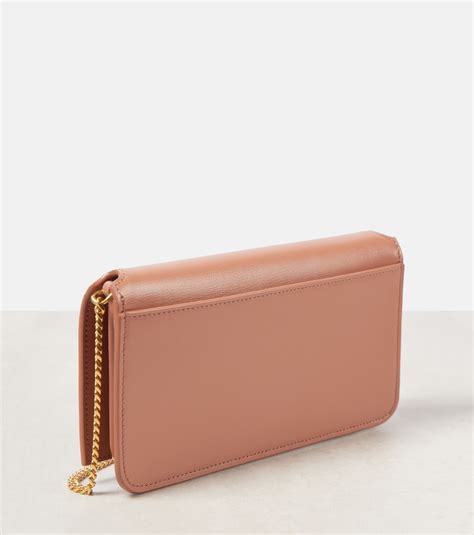 Cassandre Leather Phone Pouch In Pink Saint Laurent Mytheresa