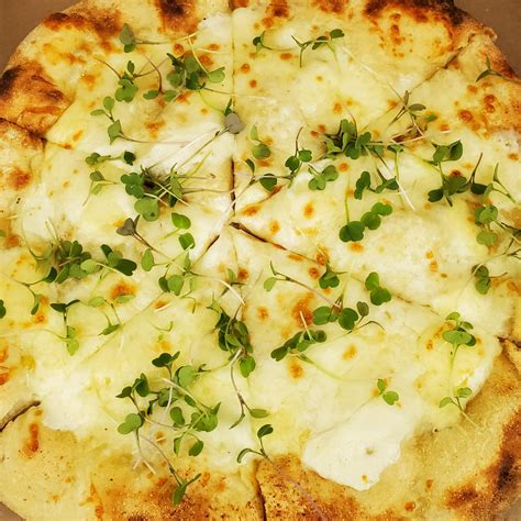 Order 4 Cheese Pizza From Rooted Locally Buffalo Ny Artisan Pizzas