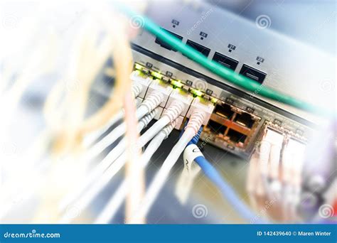 Network Server Rack With Ethernet Cables On Switches In A Data System