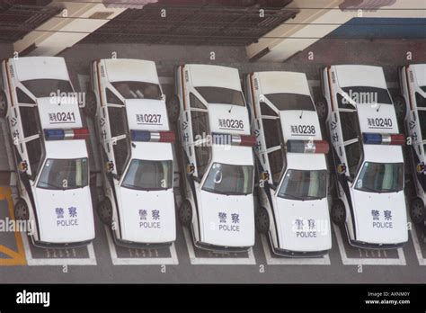 Lineup Of Chinese Police Cars Outside A Police Building In Shanghai