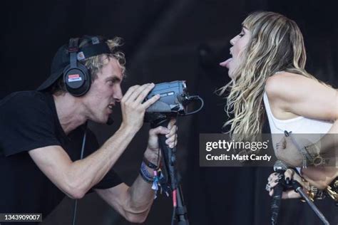 Miley Cyrus Tongue Photos And Premium High Res Pictures Getty Images