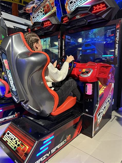 Woman Driving A Racing Game Girl On A Racing Car Simulator Concept