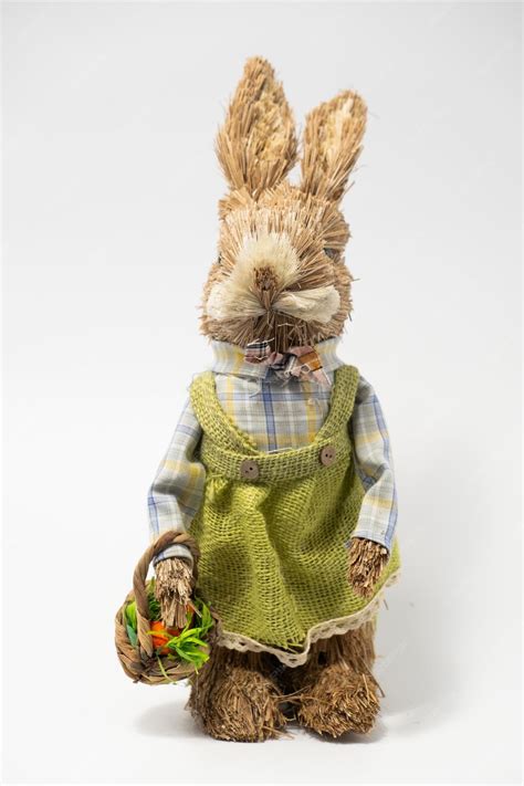Premium Photo Easter Decorations Hare Rabbit Of Straw Easter Toy Rabbit Made Of Straw With A
