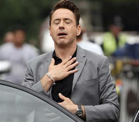 Robert Downey Jr Relieved Reaction Relieved Happy Relaxing Hand