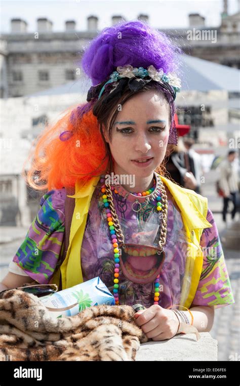 A Fashionista Presents Her Own Street Style Fashion Outside A Runway