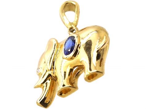 18ct Gold Elephant Pendant Set With A Sapphire And Diamond 600w The