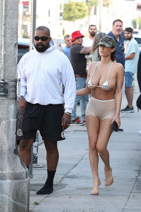 Bianca Censori Wears Metallic Micro Bikini And Clear Heels In Latest
