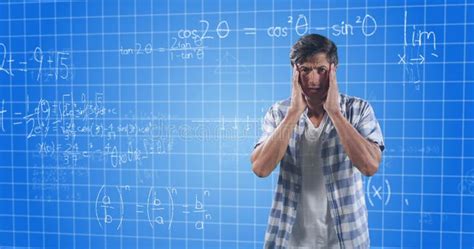 Confused Man Holding Head Standing In Front Of Complex Math Equations