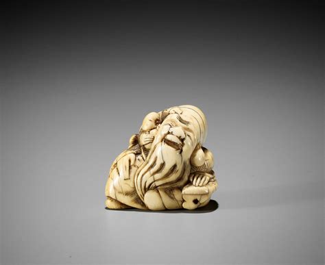 Lot 619 An Ivory Netsuke Of Fukurokuju With Karako