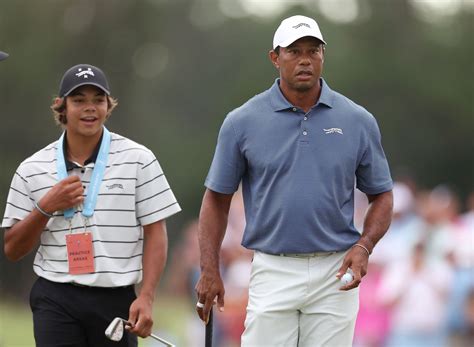 Tiger Woods In Pictures Tiger Woods And Charlie Woods Heartwarming