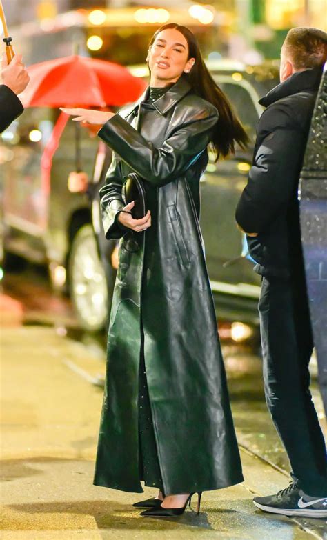 Dua Lipa In A Green Leather Coat Arrives At The Late Show With Stephen