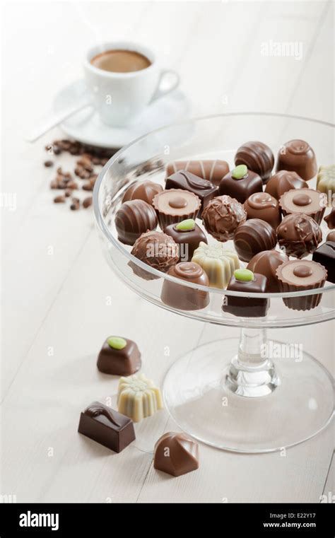 Assorted Chocolates Confectionery On Tray With Cup Of Coffee Stock