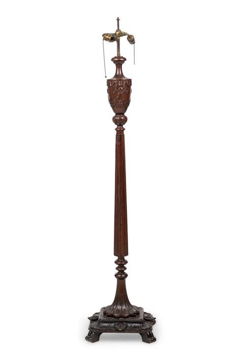 English Victorian Elaborately Carved Mahogany And Brass Floor Lamp For