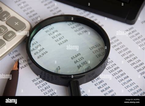Business Analysis Concept Magnifying Glass With Calculator And Number